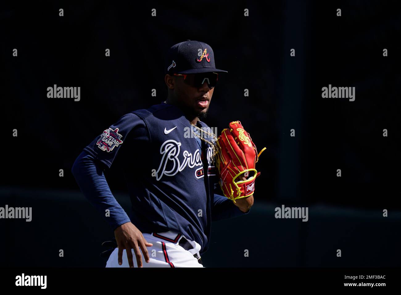 Atlanta Braves' Ronald Acuna Jr., runs in the outfield during spring ...