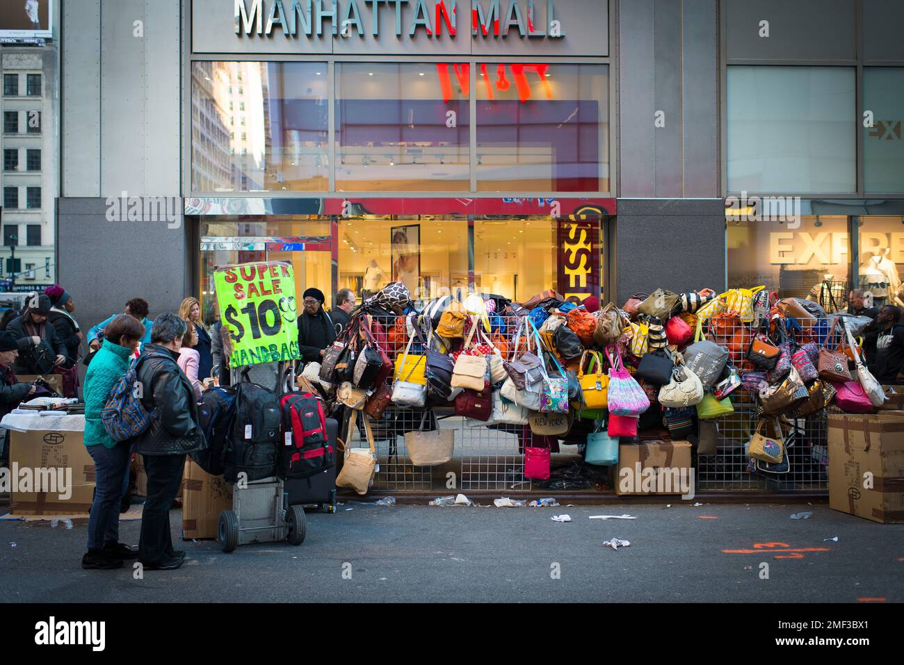 City street vender selling bags Stock Photo - Alamy
