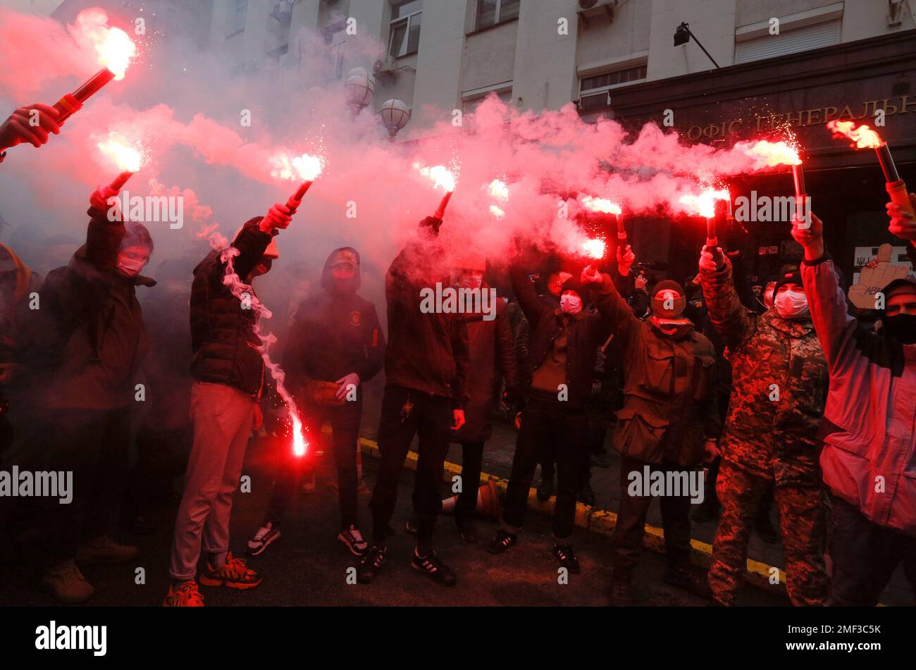 Activists light flares at a rally in front of Ukraine's Prosecutor ...