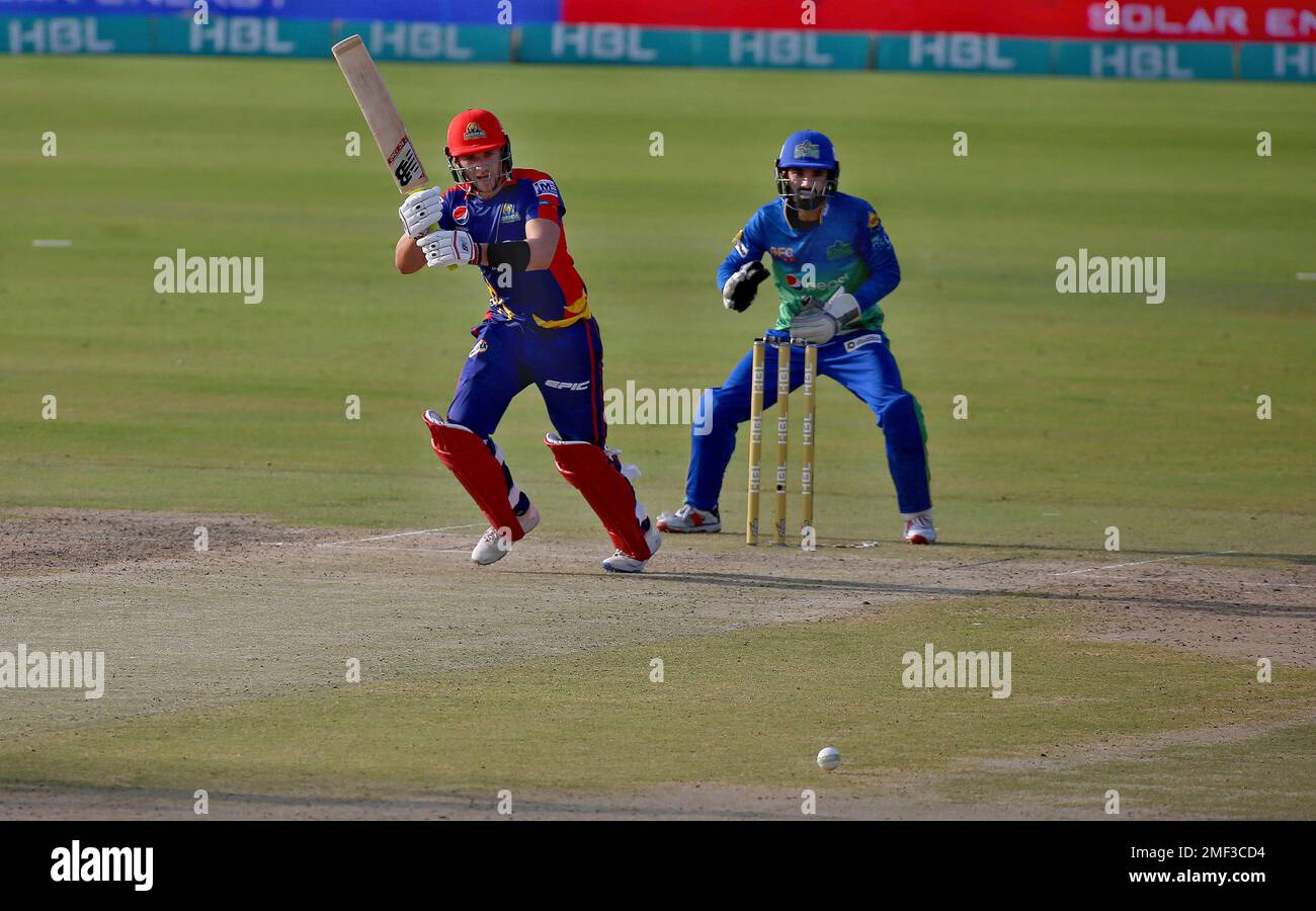 Karachi Kings' Joe Clarke, center, plays a shot while Multan Sultans ...