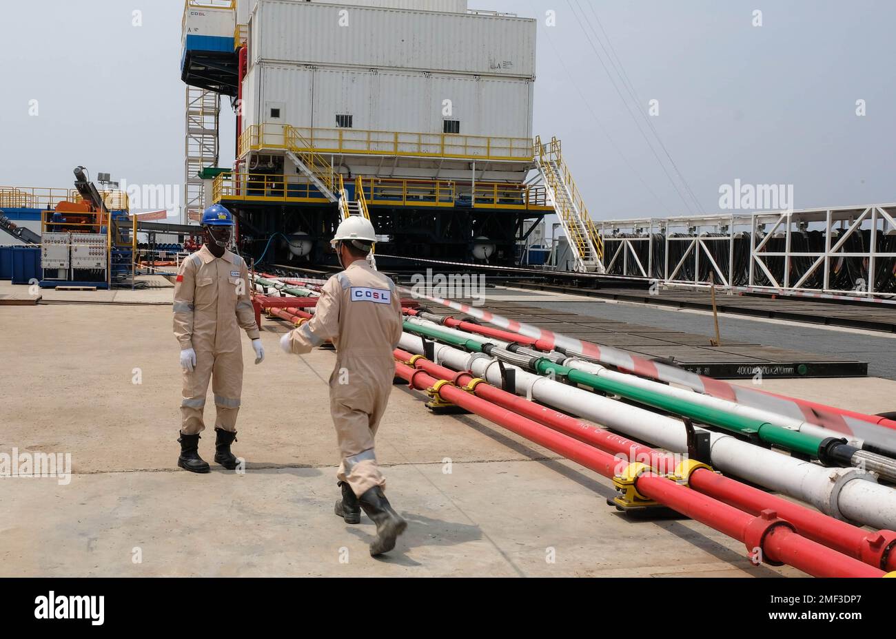 Kikuube, Uganda. 24th Jan, 2023. Workers are seen at the Kingfisher Oil Field in Kikuube, Uganda ...