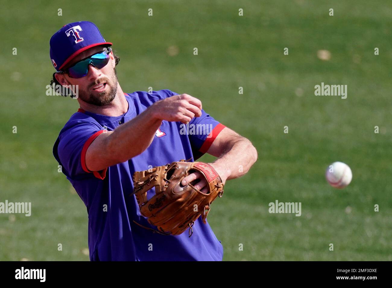 Texas Rangers' Charlie Culberson throws during spring training baseball ...