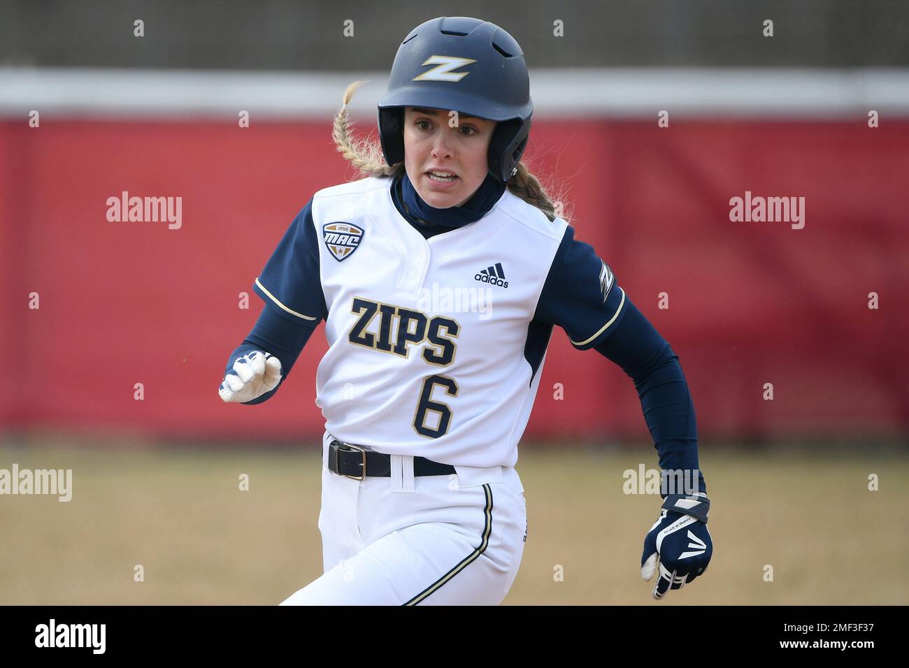 University of Akron baserunner Molly McChesney (6) runs the bases ...