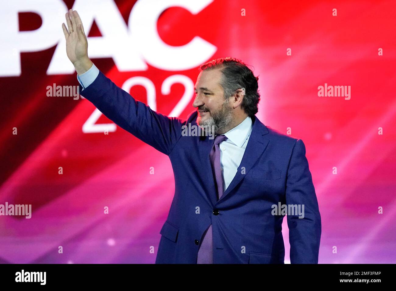Sen. Ted Cruz, R-Texas waves as he takes the stage at the Conservative ...