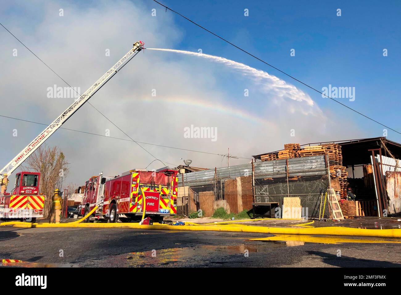 Firefighters from the Downey Fire Department battle a fire at at ...
