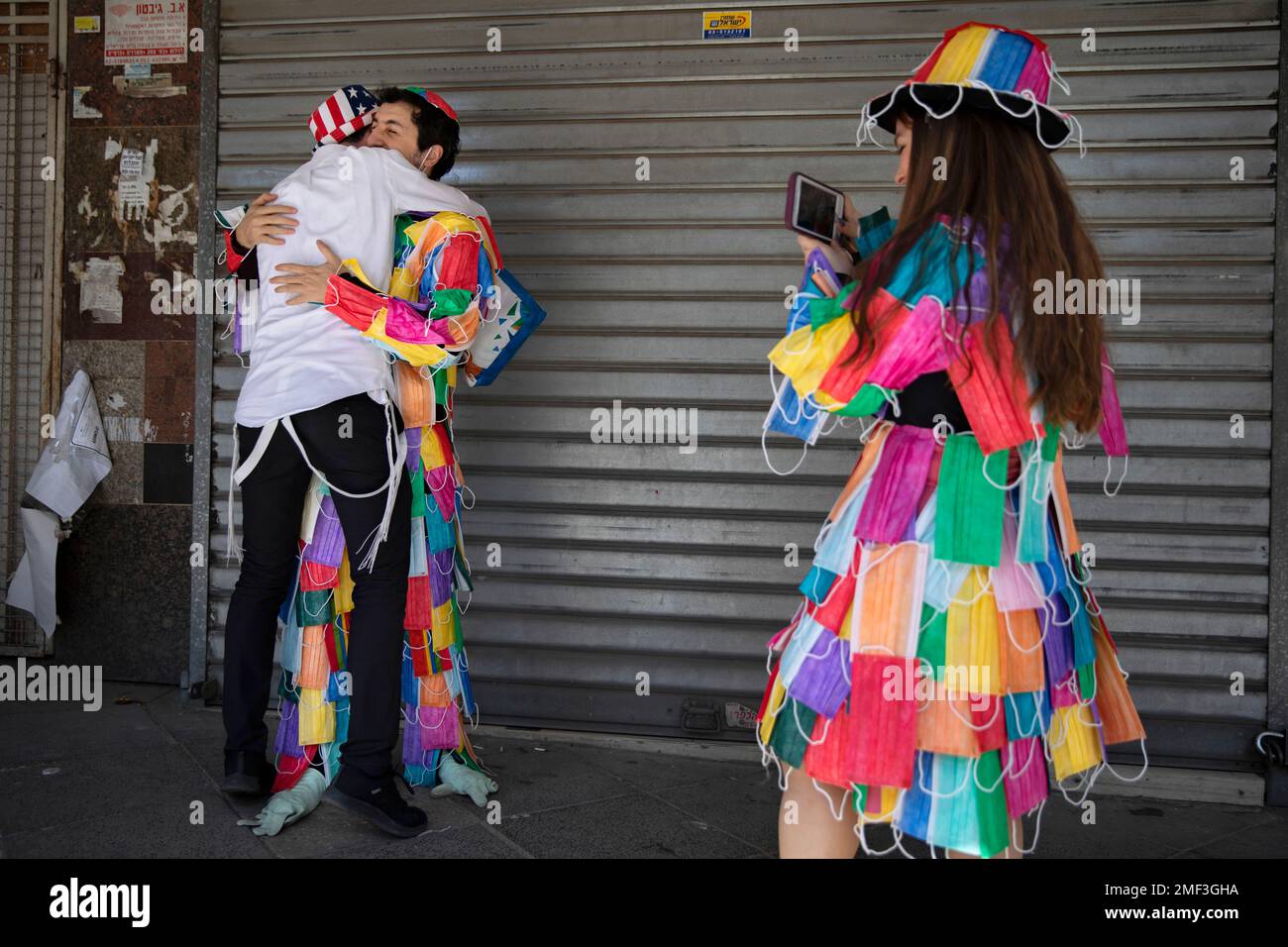 Jewish Ultra-Orthodox wearing costumes made by protective face masks ...