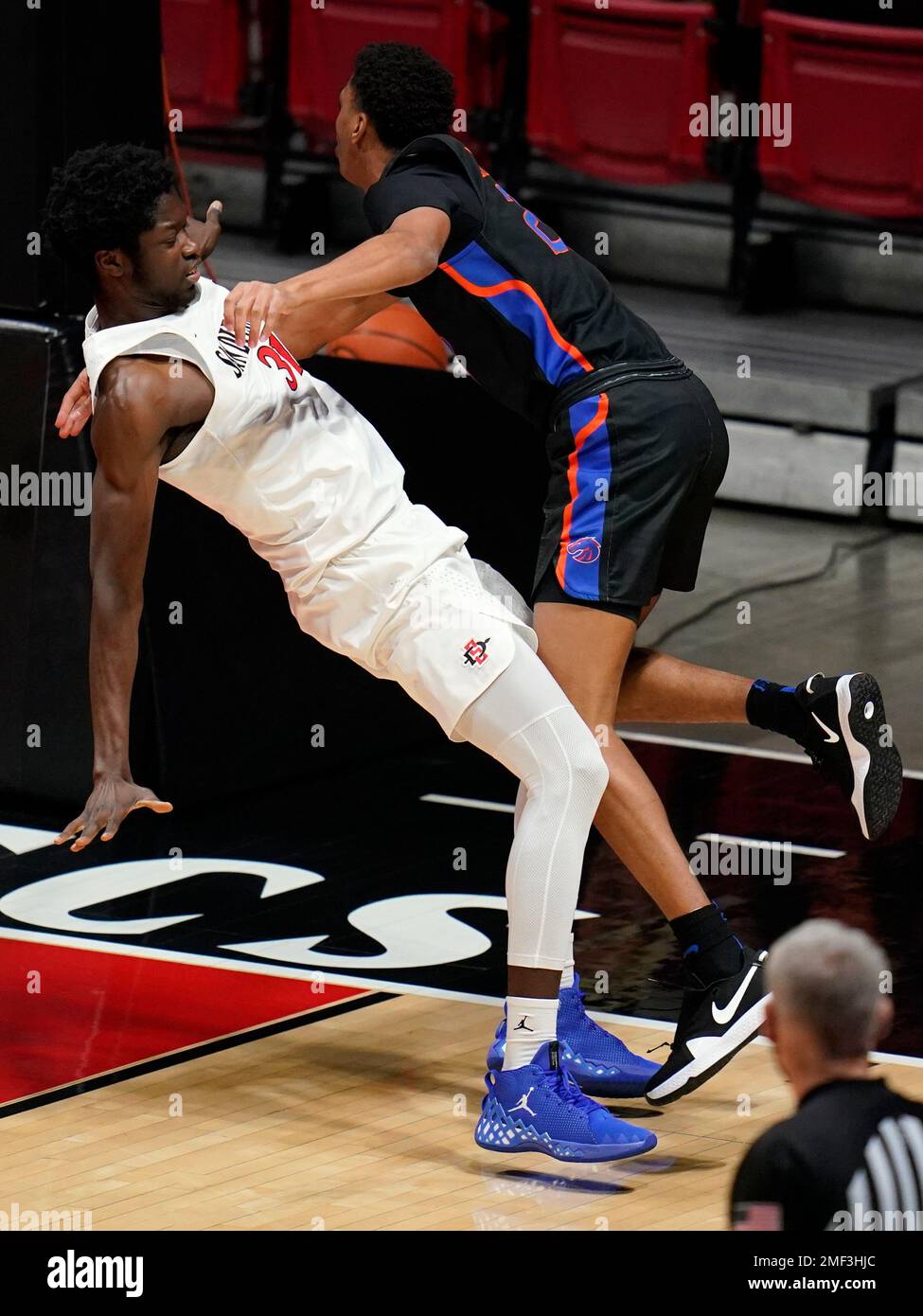 Boise State guard Derrick Alston Jr. (21) fouls San Diego State forward ...