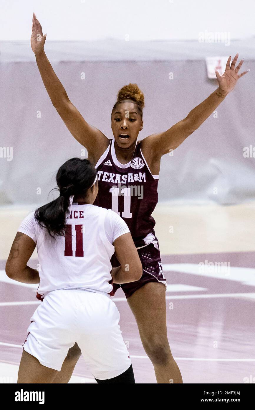 Texas A&M guard Kayla Wells (11) defends against Alabama guard Destiny ...