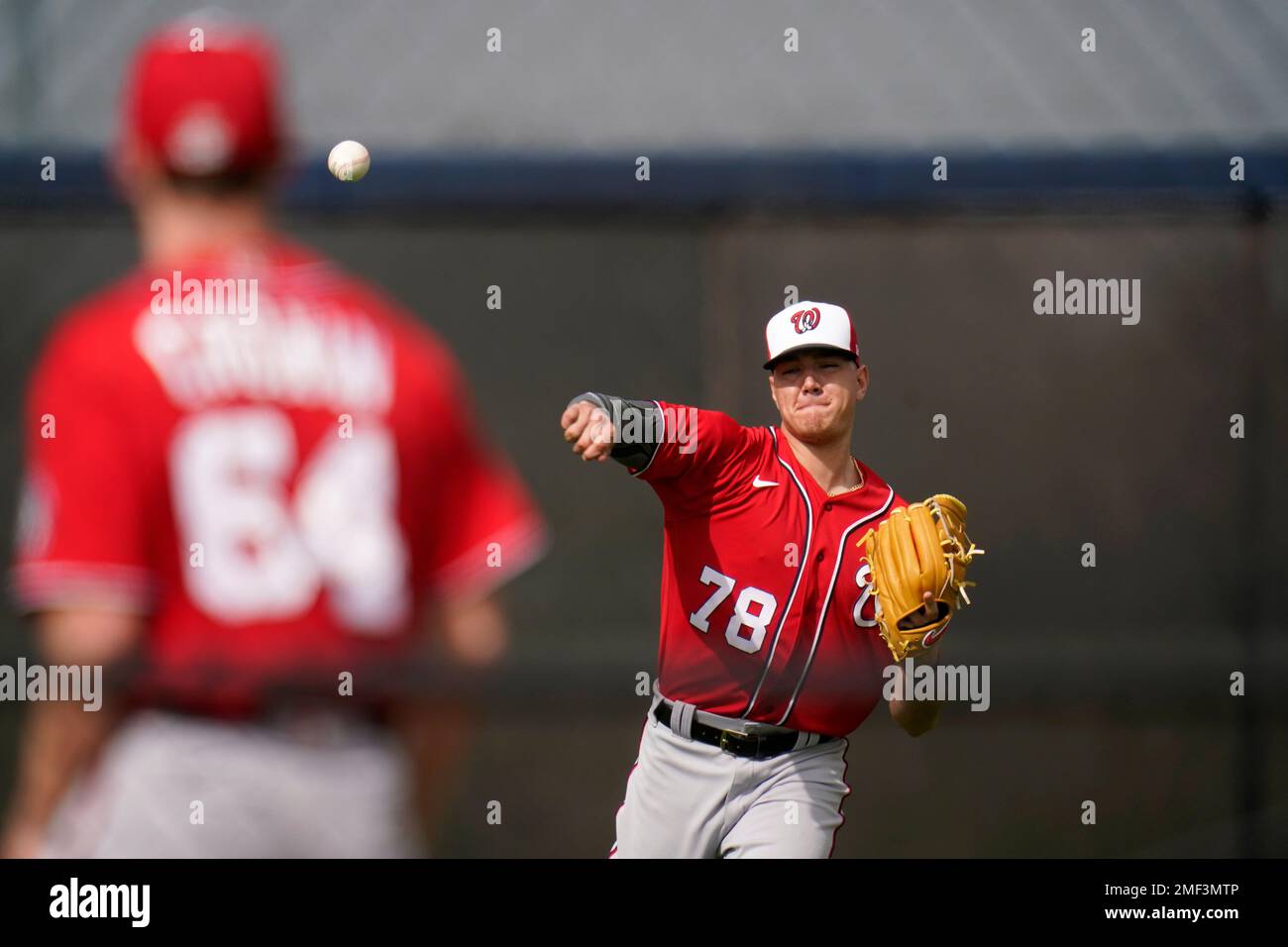Washington Nationals pitcher Cade Cavalli (78) throws during spring ...