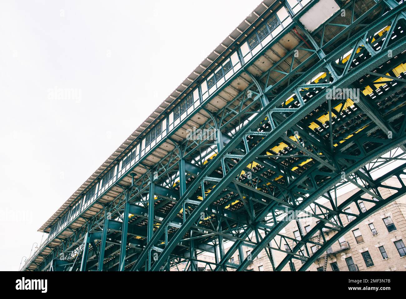 Elevated train station with arching bridge Stock Photo - Alamy