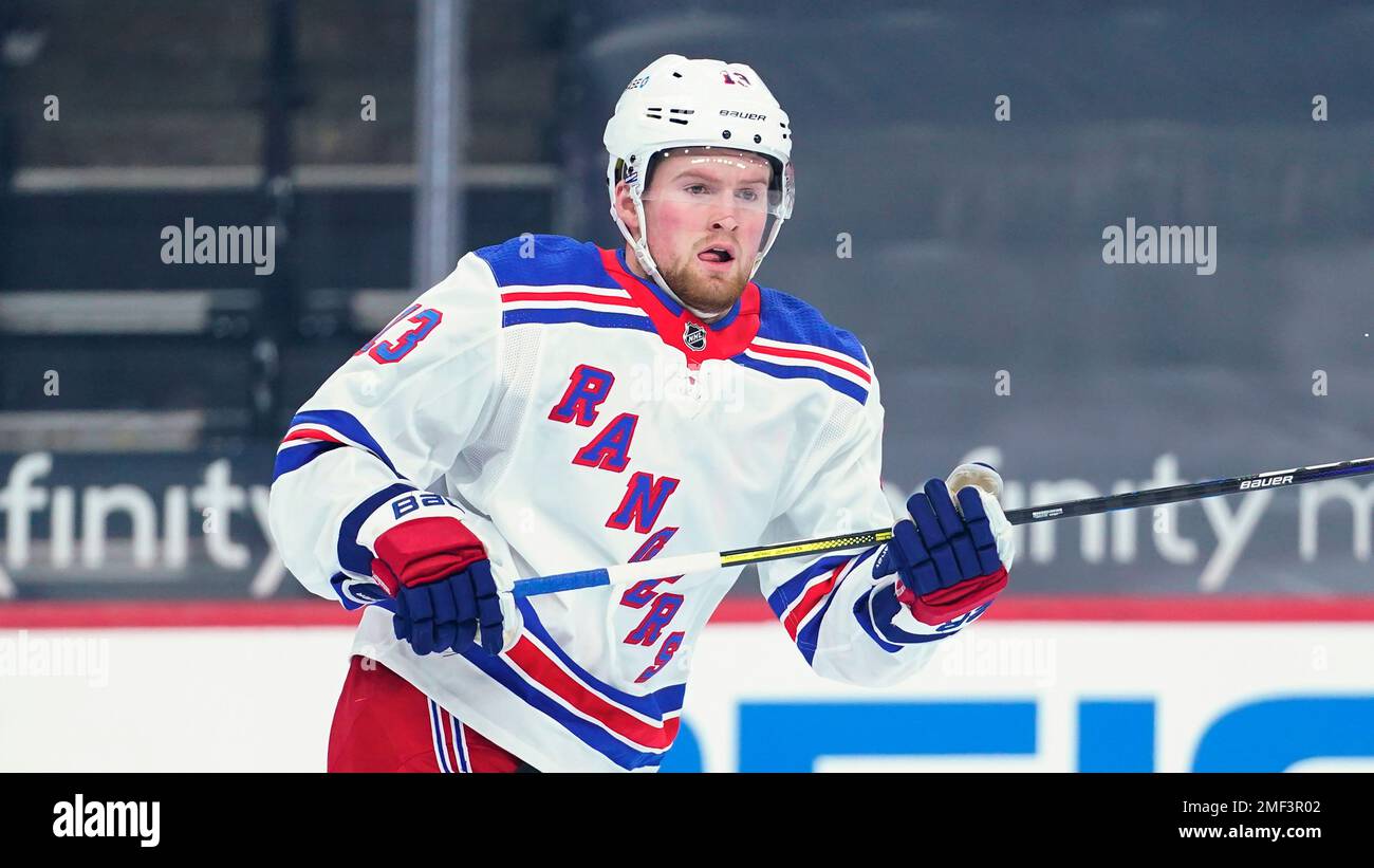 New York Rangers' Alexis Lafreniere plays during an NHL hockey game ...
