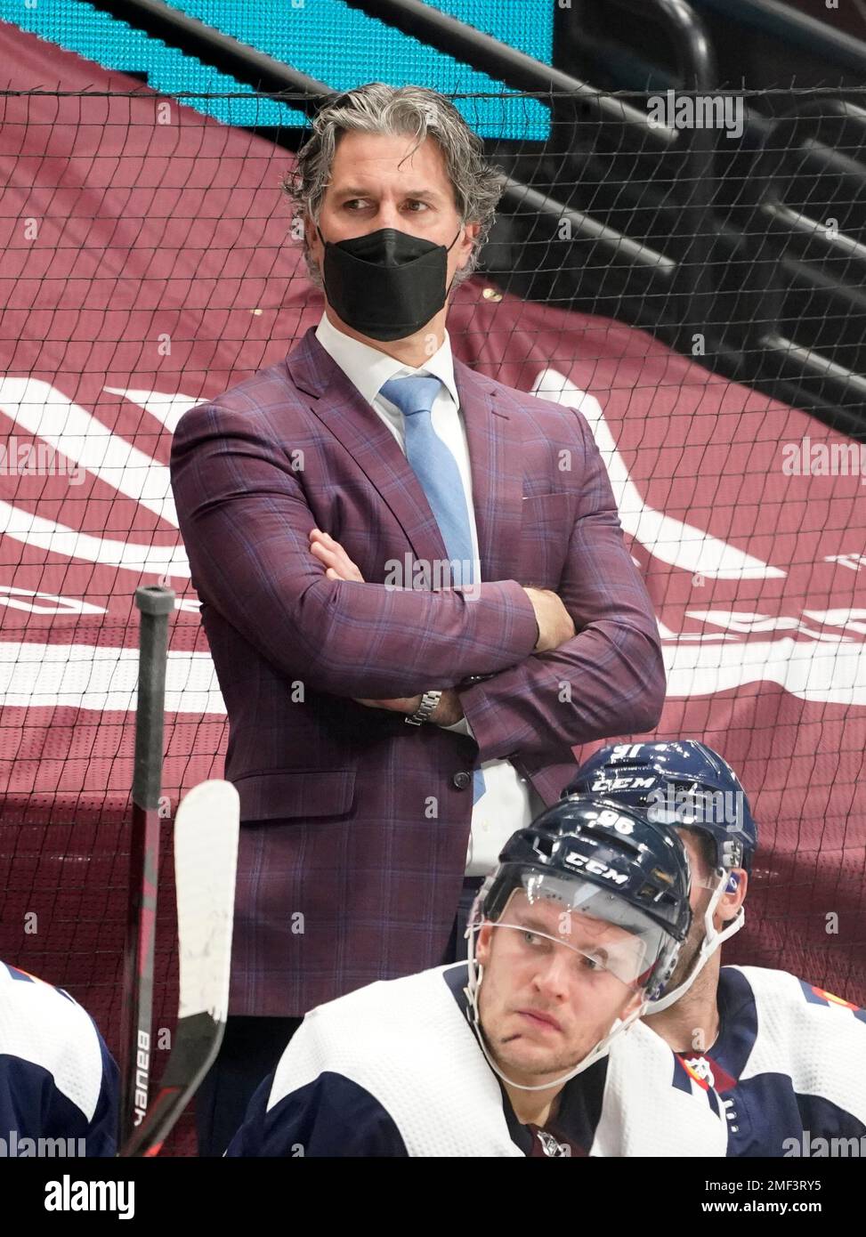 Colorado Avalanche head coach Jared Bednar, back, looks on late in the ...