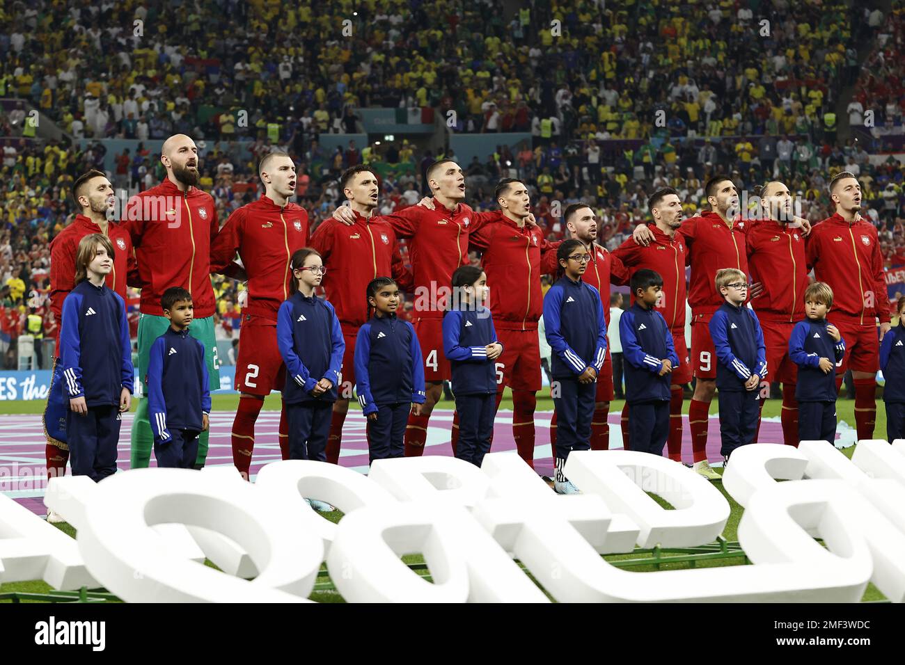 LUSAIL CITY - (LR) Dusan Tadic of Serbia, Serbia goalkeeper Vanja ...