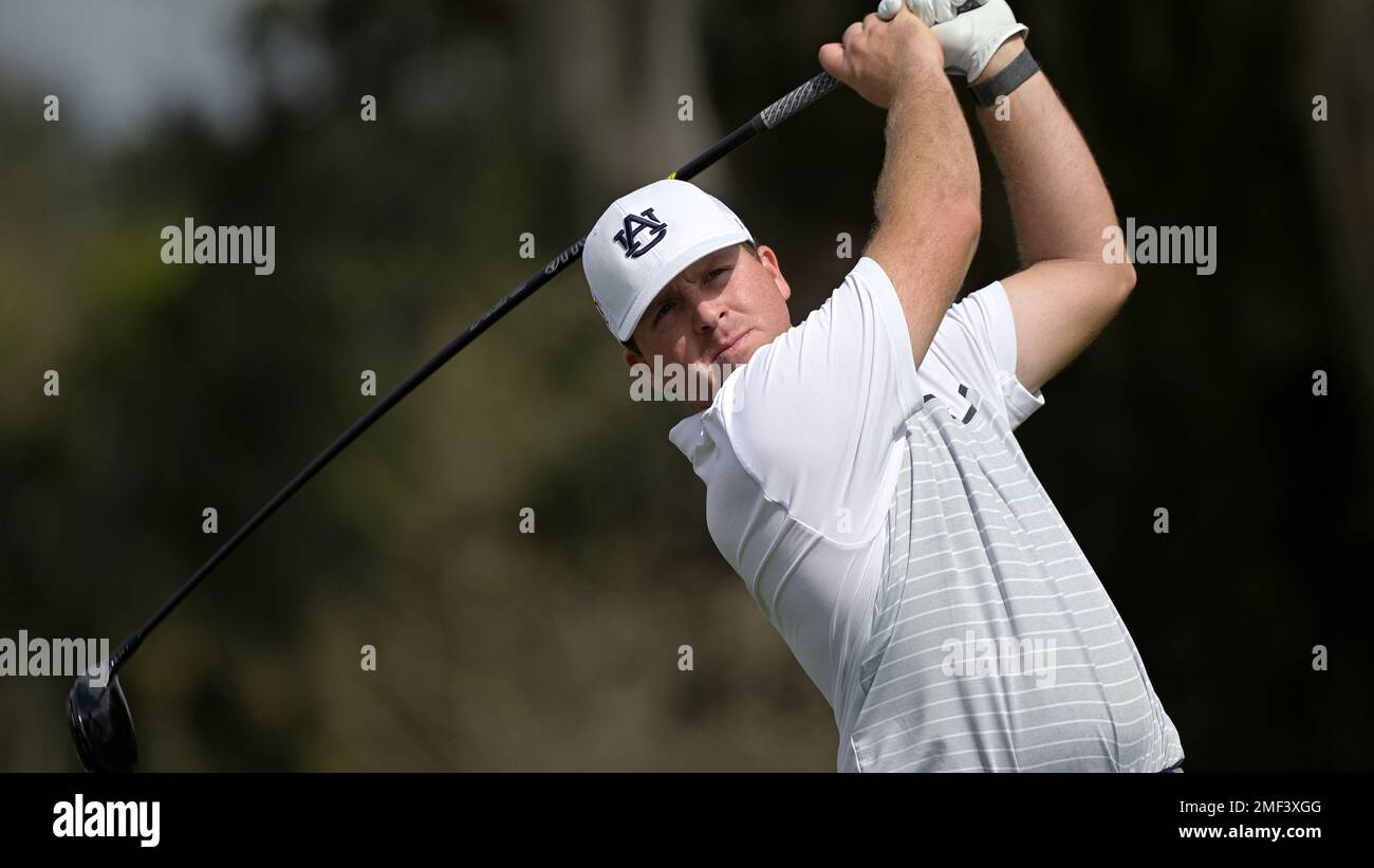 Graysen Huff, of Auburn, watches his tee shot on the 16th hole during ...