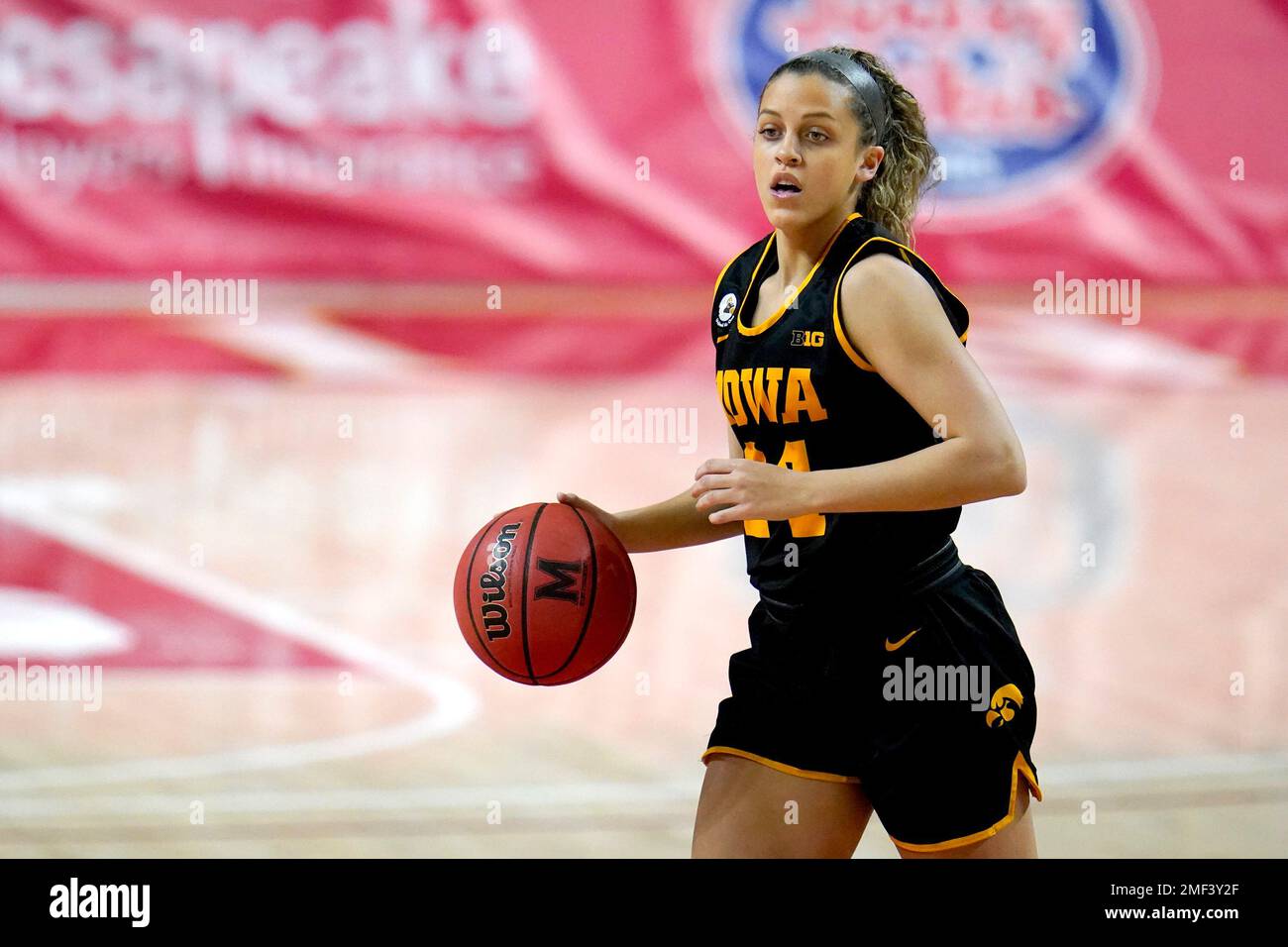 Iowa guard Gabbie Marshall dribbles up court against Maryland during ...