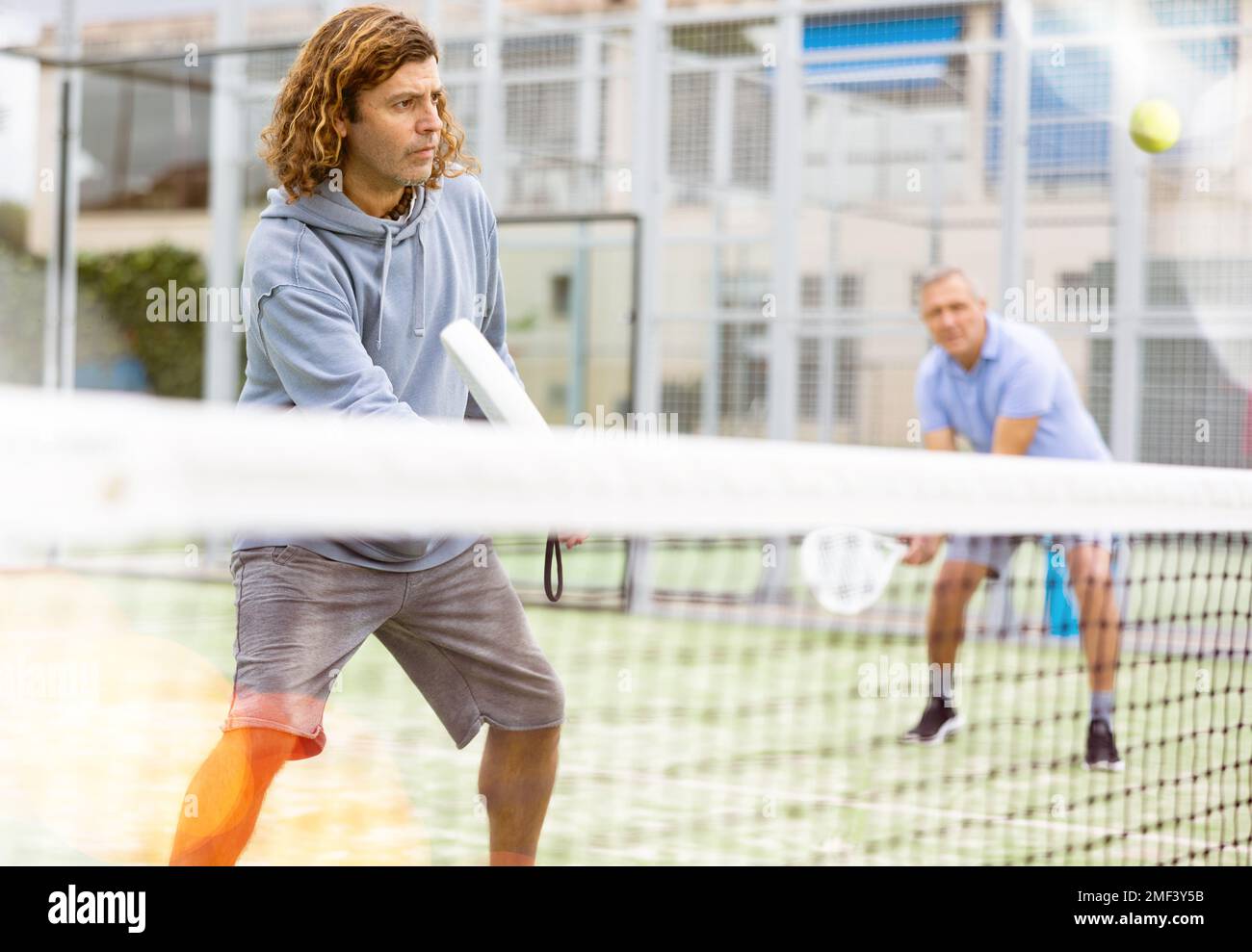 Sporty man padel tennis hi-res stock photography and images - Alamy
