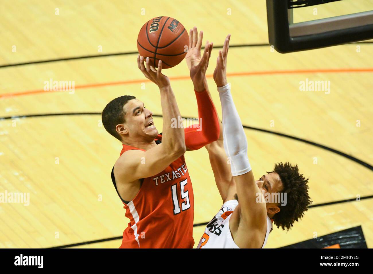 Texas Tech guard Kevin McCullar (15) takes a shot over Oklahoma State ...