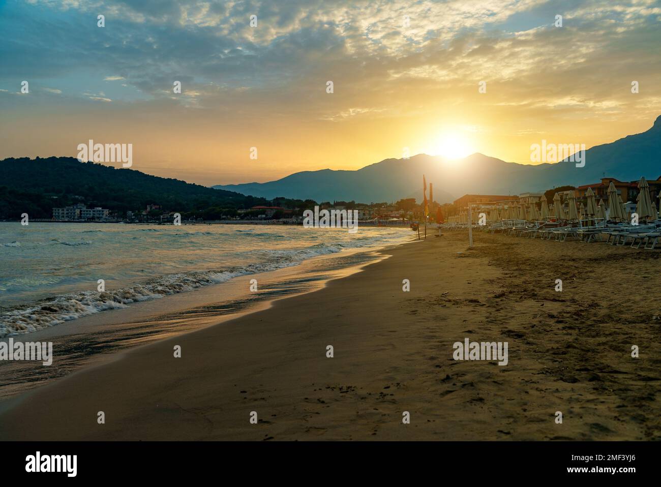 Beautiful sunset on the beach in Scauri, Italy Stock Photo - Alamy