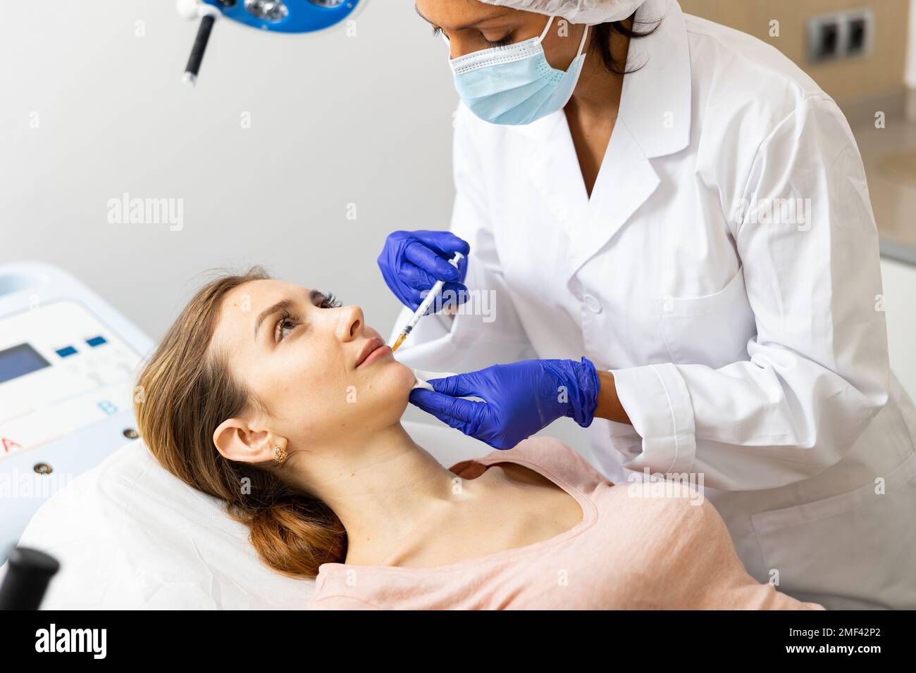Beautician making face injections hi-res stock photography and images - Alamy