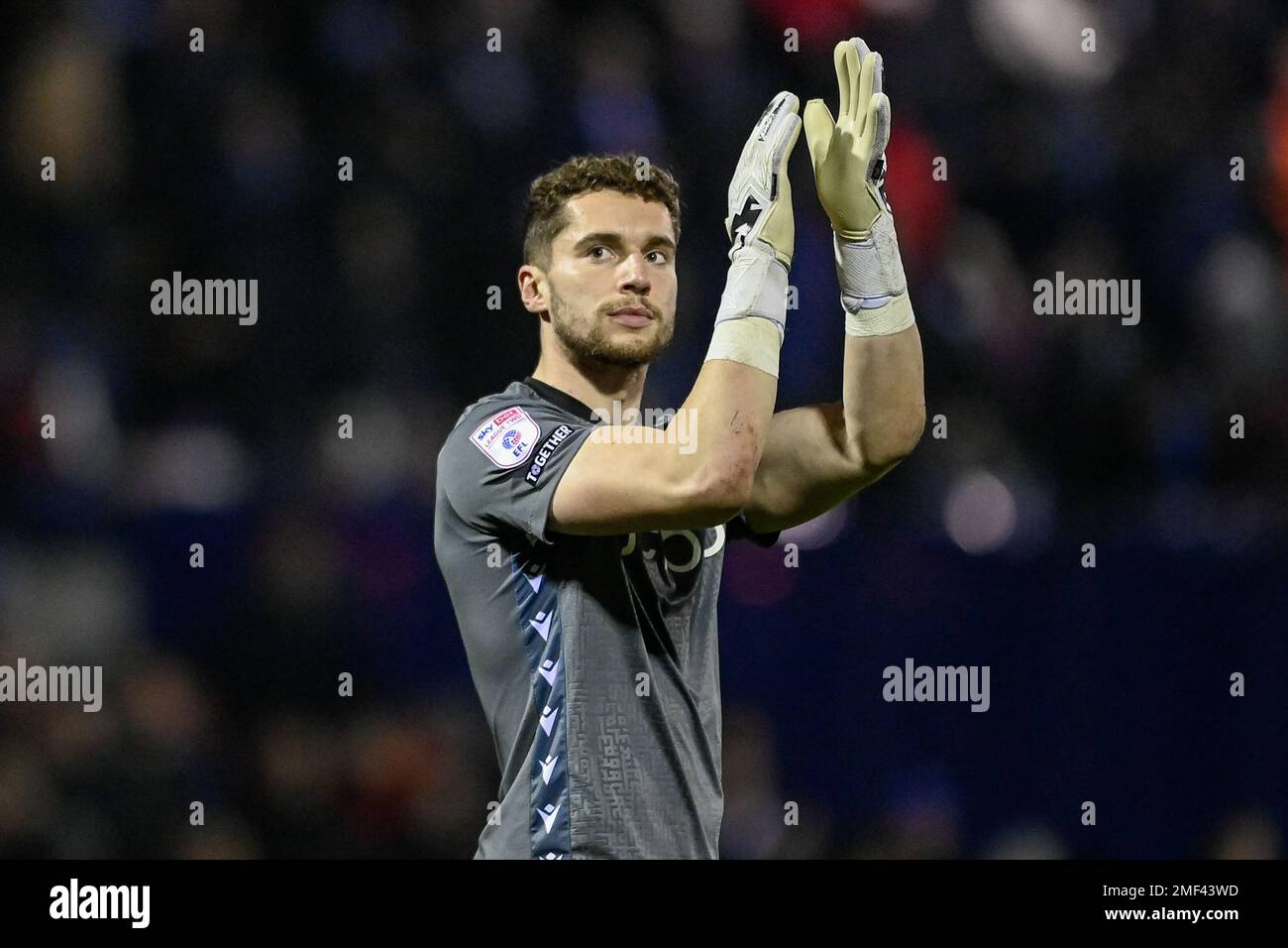 Harry Lewis #1 of Bradford City applauds the travelling fans during the ...