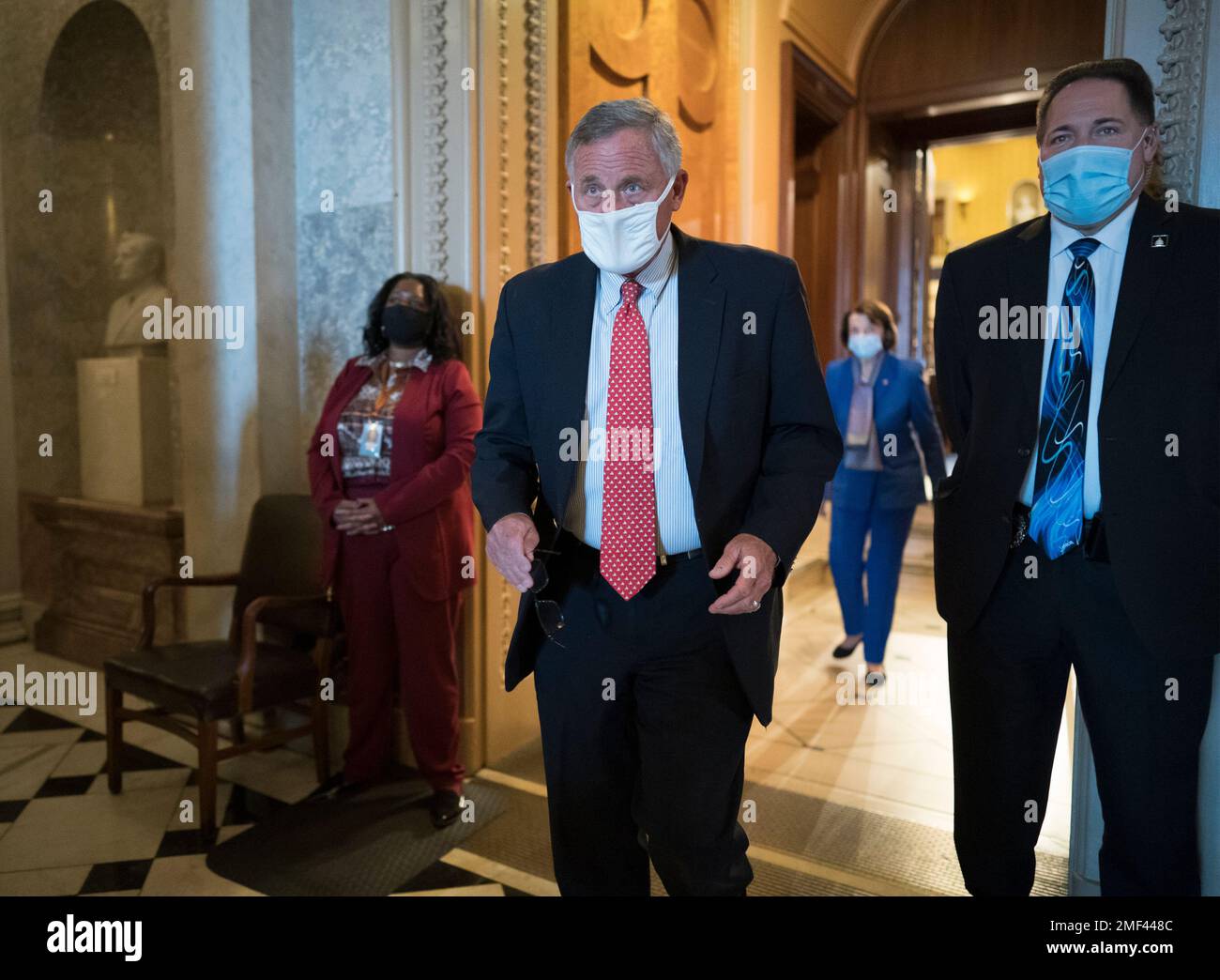 Sen. Richard Burr, R-N.C., leaves the chamber as senators arrive to ...