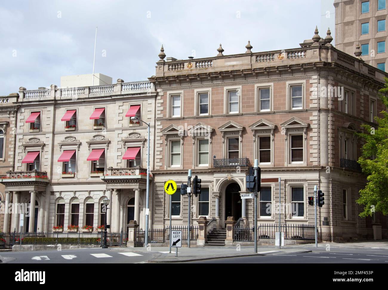 The view of historic buildings and the original crossing street sign in ...
