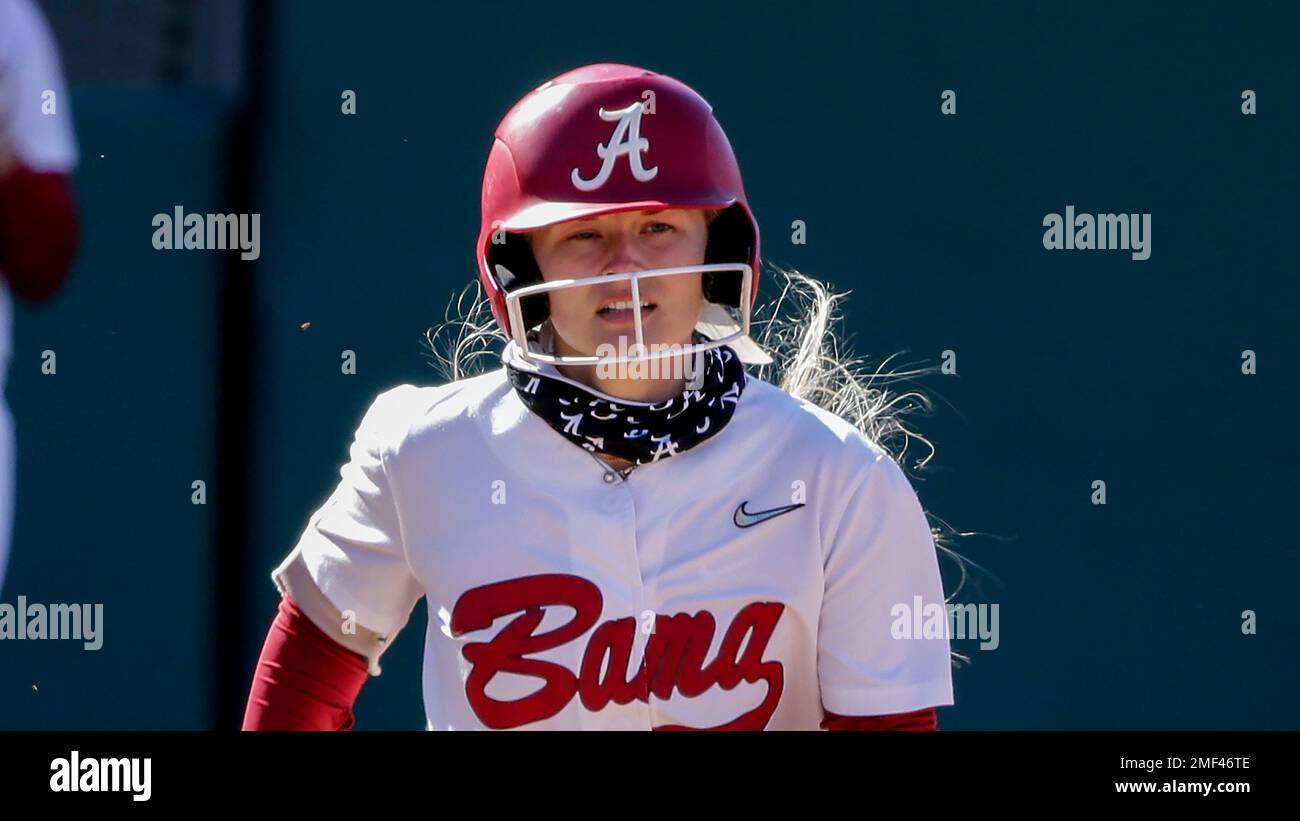 Alabama KB Sides (8) runs to first during an NCAA softball game against ...