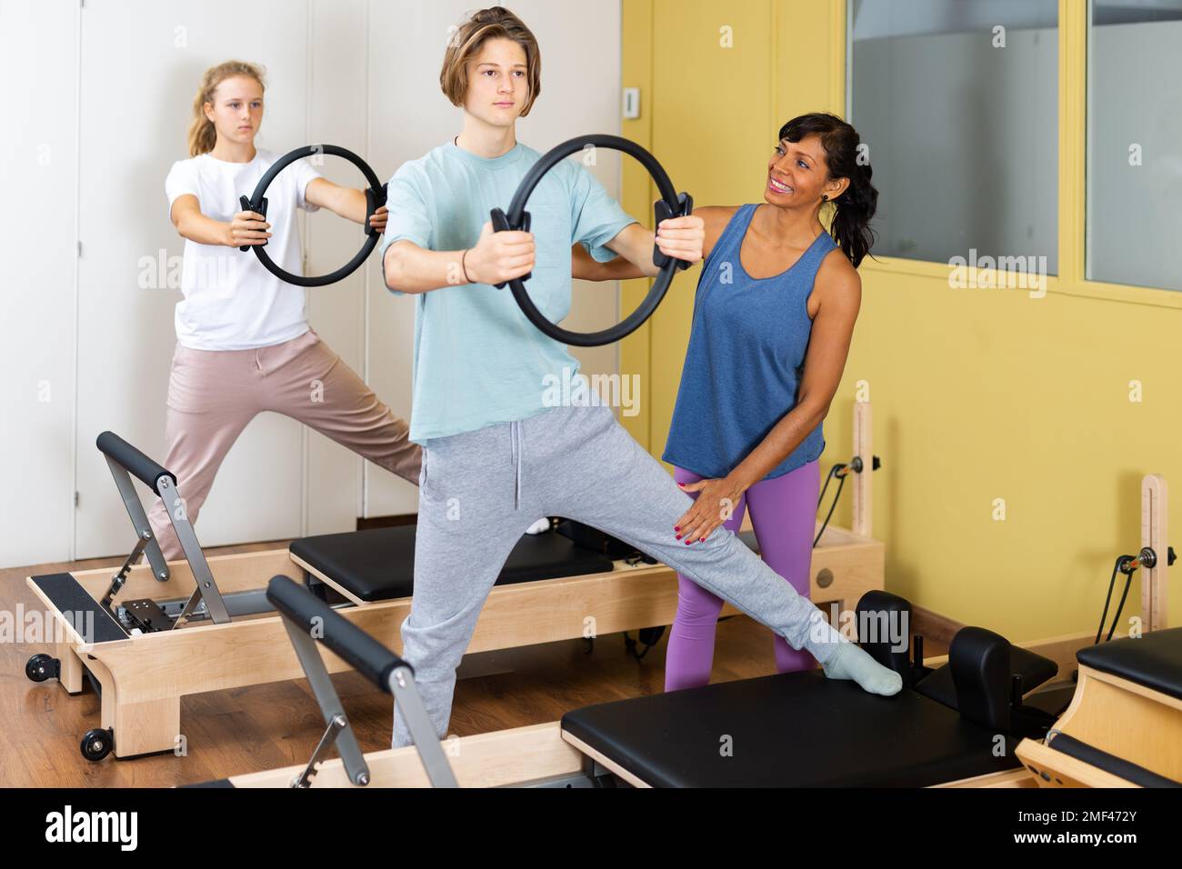 Helping stretch teenager hi-res stock photography and images - Alamy