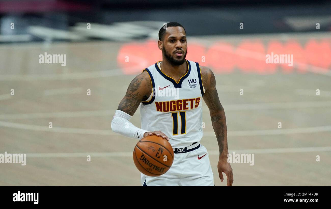Denver Nuggets' Monte Morris drives in the second half of an NBA ...