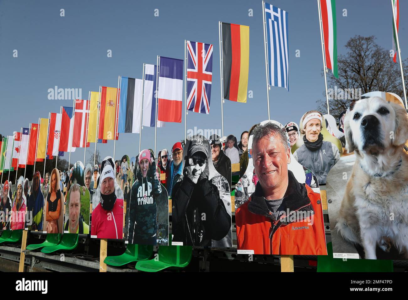 Cardboard spectators stand at the cross country stadium while athletes ...
