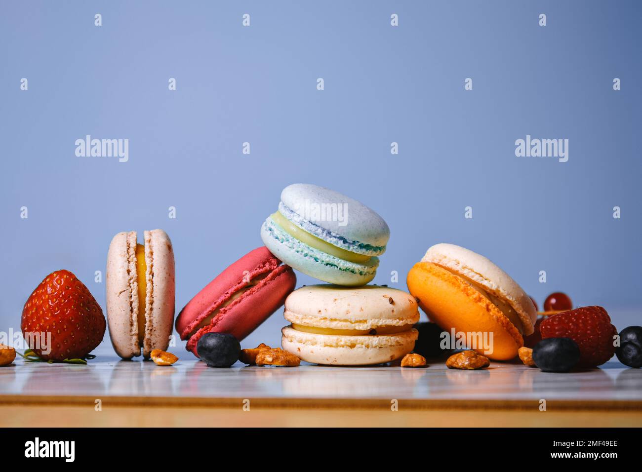 Colorful macarons. Small French cakes. Sweet and colorful french ...