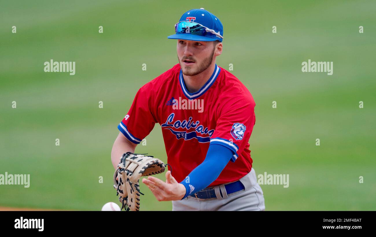 Louisiana Tech outfielder Bryce Wallace (18) throws during an NCAA ...
