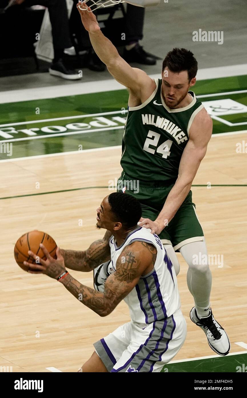 Milwaukee Bucks' Pat Connaughton fouls Sacramento Kings' DaQuan ...