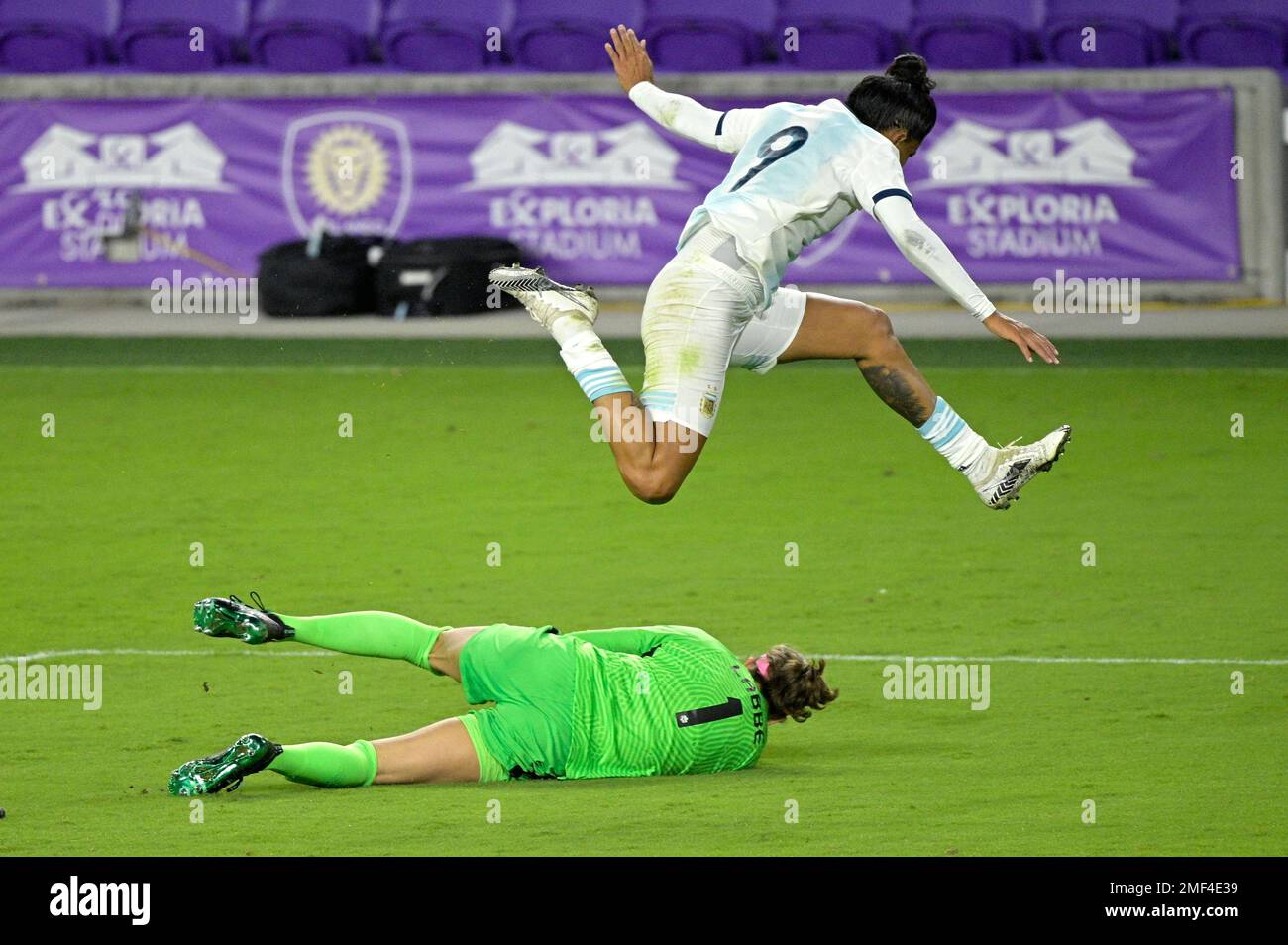 Canada goalkeeper Stephanie Labbe (1) dives for a ball as Argentina ... Canada goalkeeper Stephanie Labbe (1) dives for a ball as Argentina ...