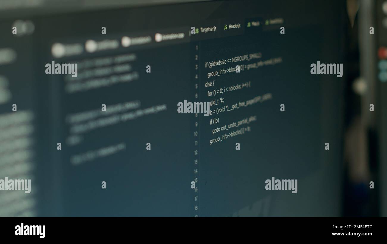 Monitor Display Of Software Developer Typing Database Functions Script To Code System Server In