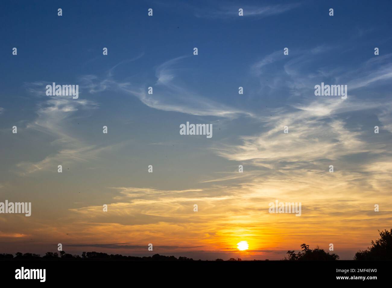 sunset sky with multicolor clouds. Dramatic twilight sky background ...