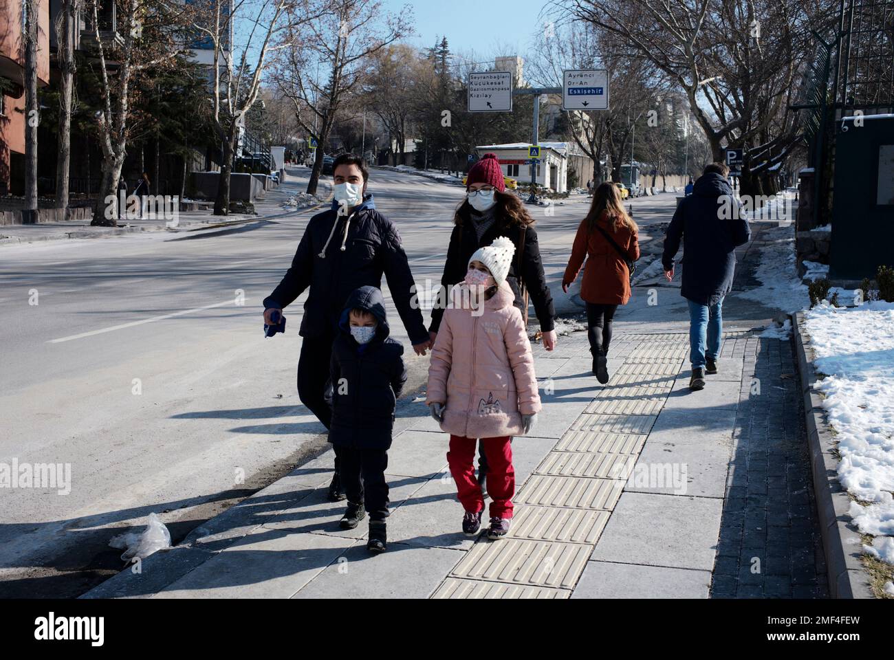 People wearing masks to help protect against the spread of coronavirus ...