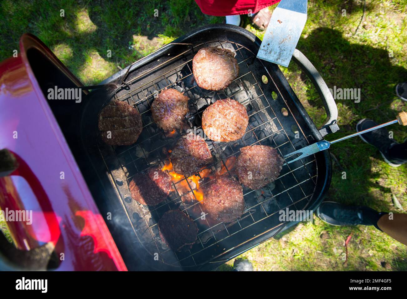 BBQ grill from above with beef patties Stock Photo - Alamy