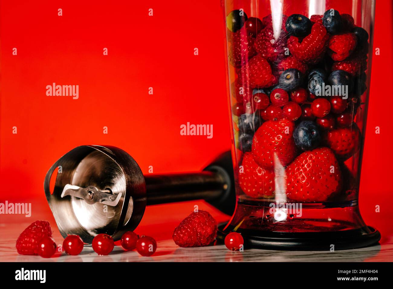 Fruit in a blender, mixer. Fruit cocktail and healthy food and drinks ...
