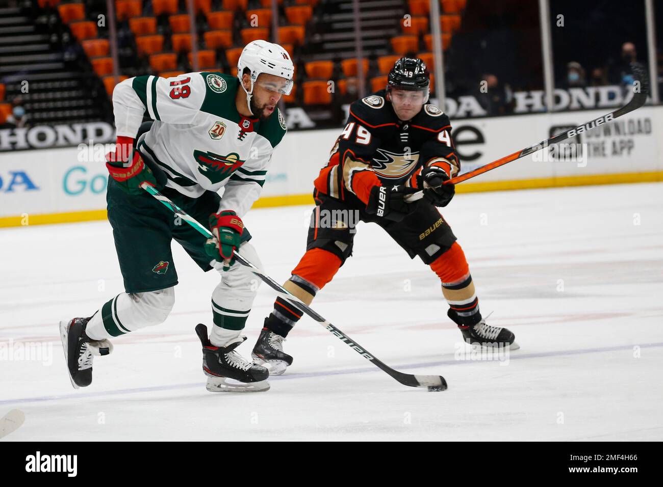 Minnesota Wild forward Jordan Greenway (18) controls the puck away from ...
