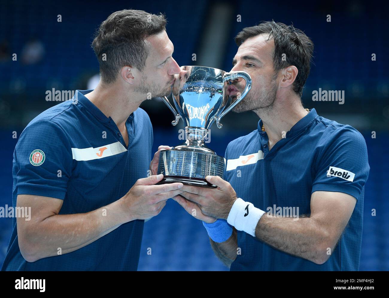 Croatia's Ivan Dodig, right, and Slovakia's Filip Polasek kiss their ...