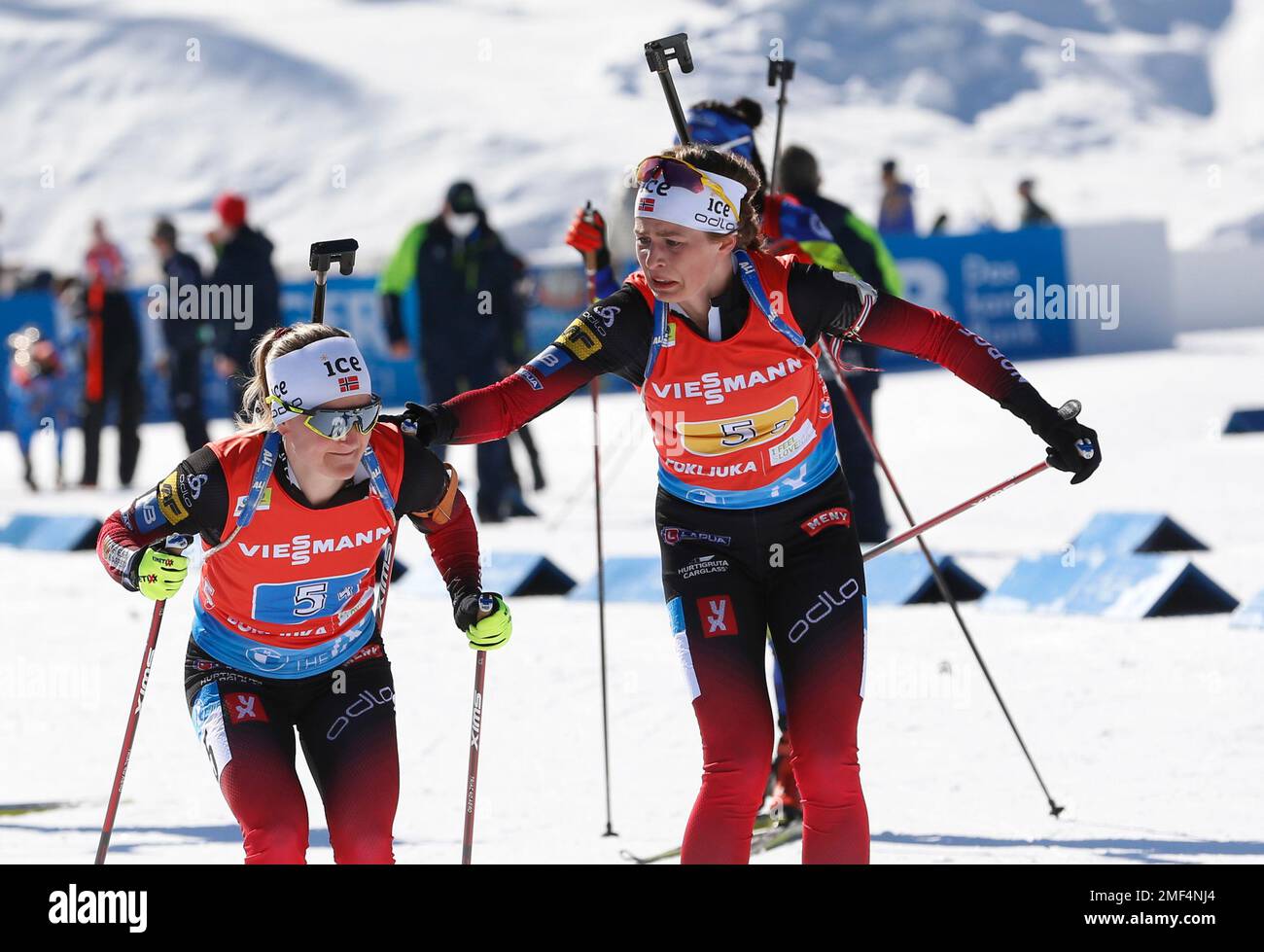 Norway's Marte Olsbu Roeiseland, left, and Norway's Ida Lien compete ...