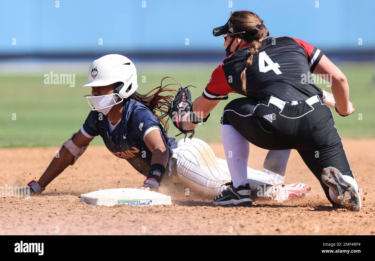 UConn outfielder Aziah James (5) slides into second base safe before ...