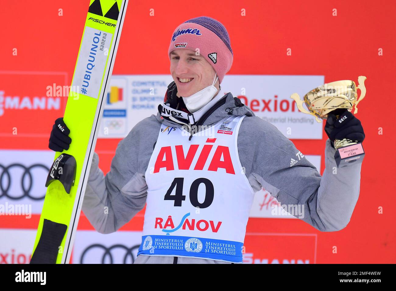 Third place winner Germany's Karl Geiger poses at the men's Ski Jumping ...