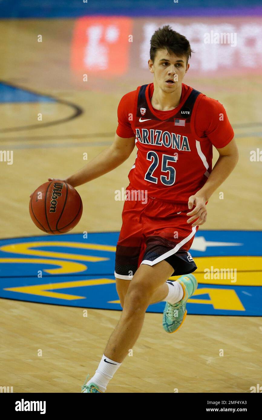 Arizona guard Kerr Kriisa (25) drives during an NCAA college basketball ...