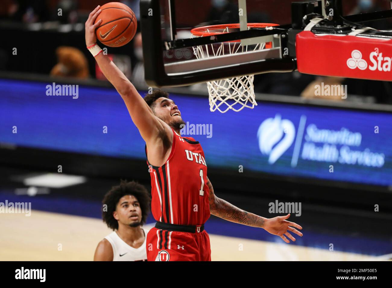 Utah's Timmy Allen drives to the basket past Oregon State's Ethan ...