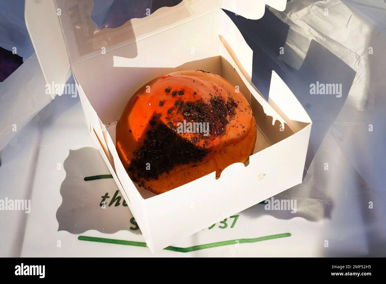 A Krispy Kreme donut resembling the rover's destination Mars, named the ...