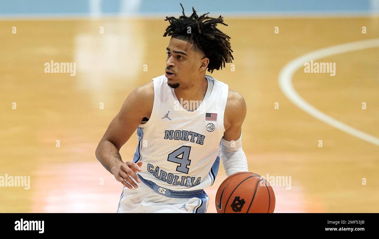 North Carolina guard R.J. Davis (4) dribbles against Northeastern ...