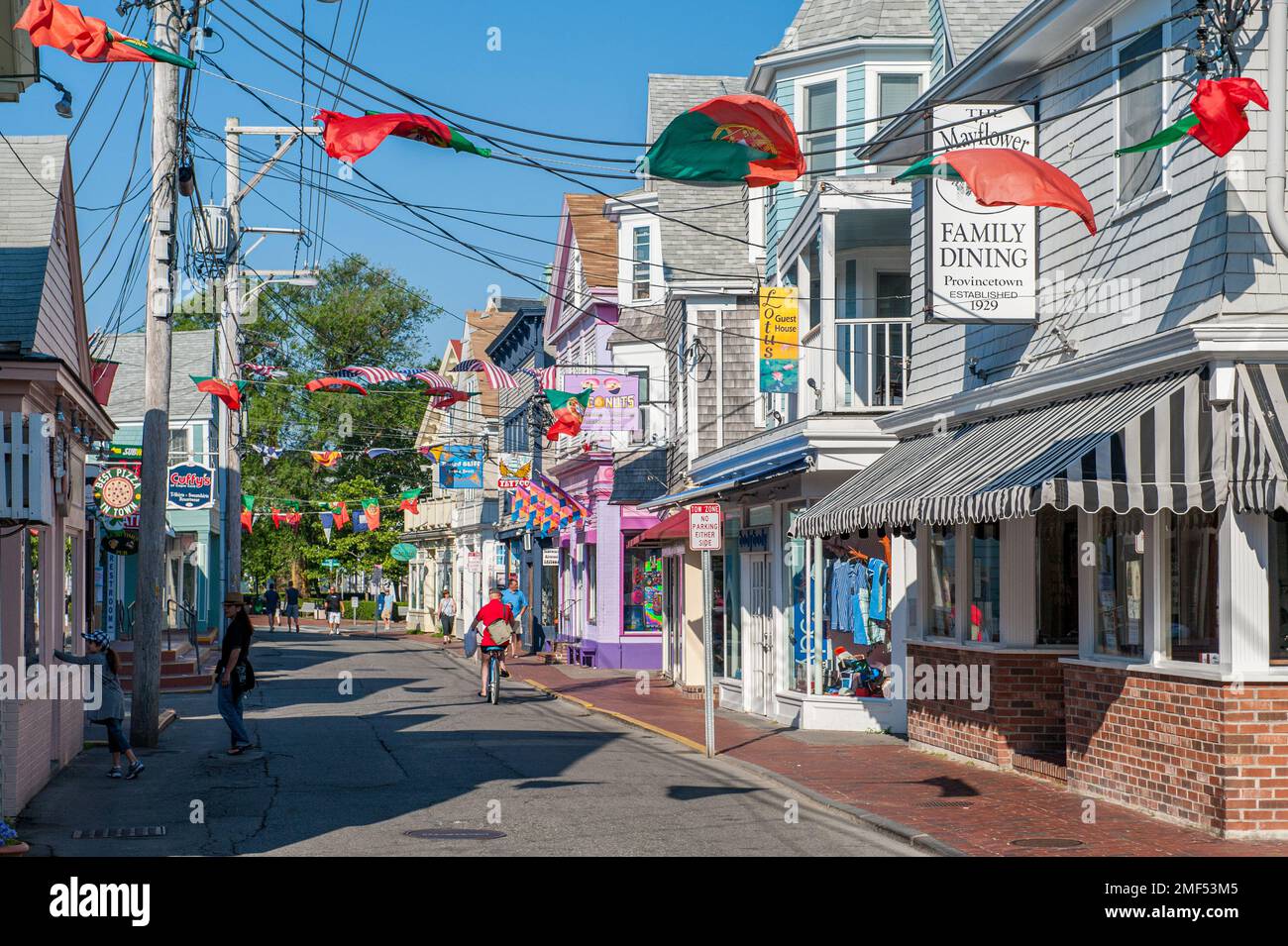 Iconic Commercial Street in Provincetown. Cape Cod is a popular travel ...