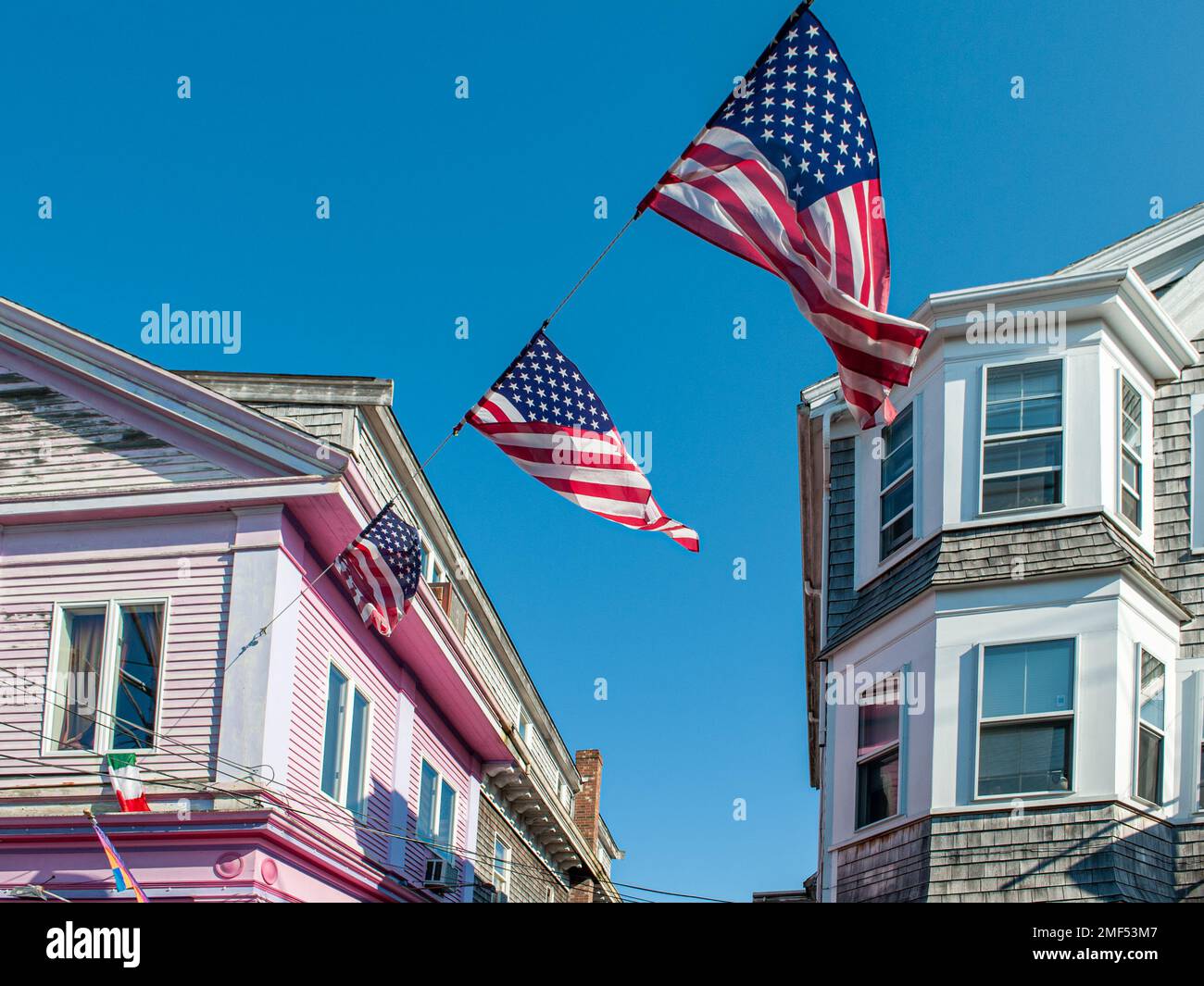 Iconic Commercial Street in Provincetown. Cape Cod is a popular travel ...